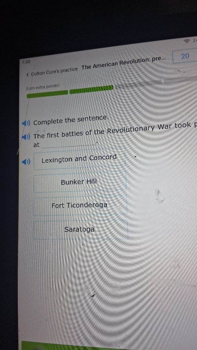 Complete the sentence. The first battles of the Revolutionary War took pl..