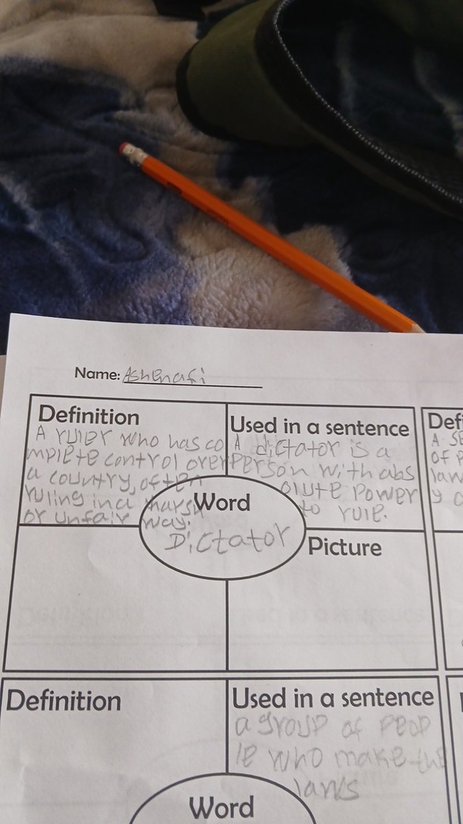 The student is asked to define the word "Dictator" and use it in a senten..
