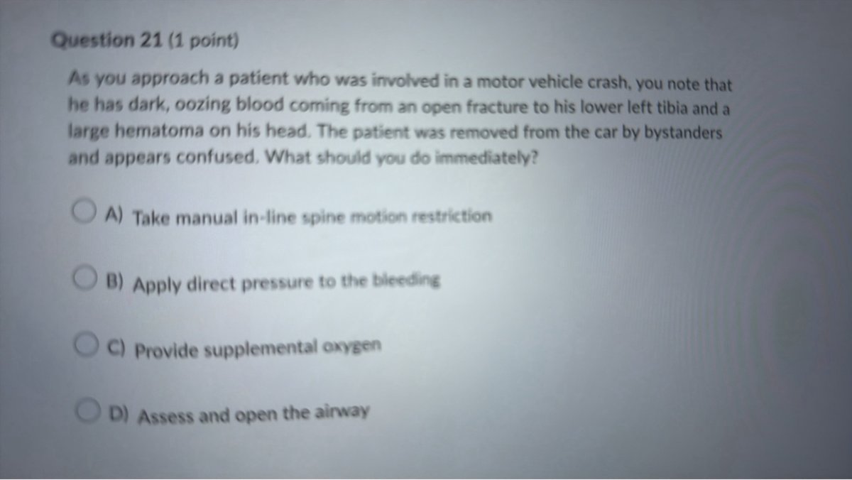 Question 21 (1 point) As you approach a patient who was involved in a mot..