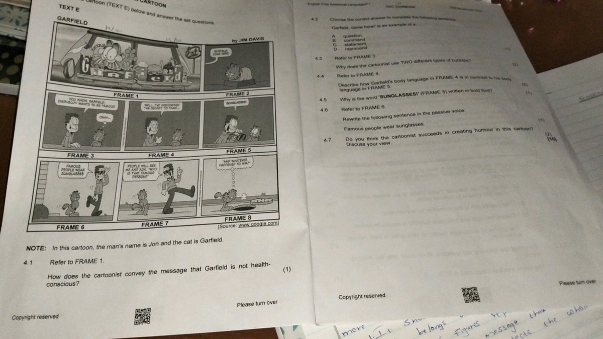 TEXT E GARFIELD by JIM DAVIS [Cartoon with 8 frames. Frame 1 shows Garfi..