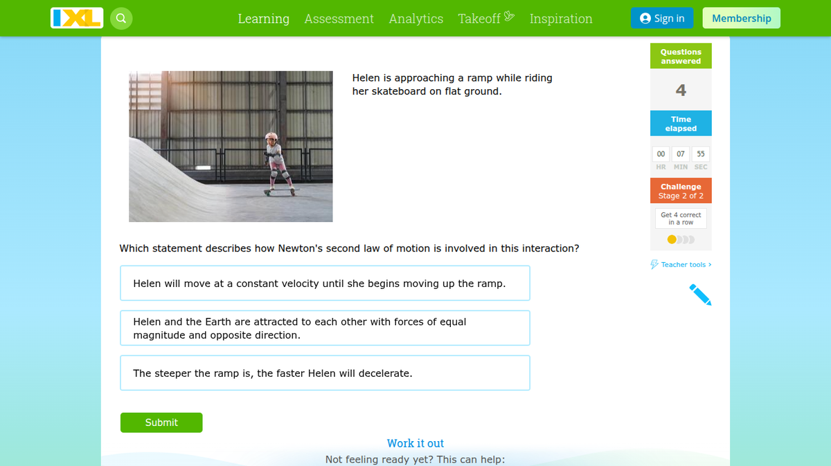 Helen is approaching a ramp while riding her skateboard on flat ground.