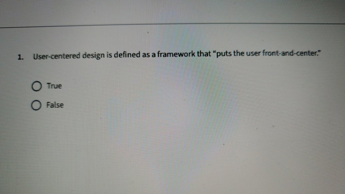 User-centered design is defined as a framework that "puts the user front-..