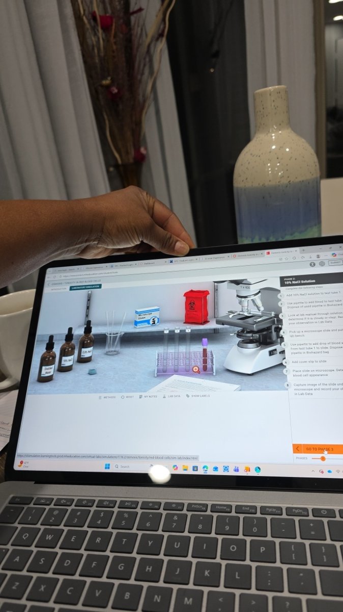 The image shows a virtual lab simulation titled "OSMOSIS - TONICITY IN RE..