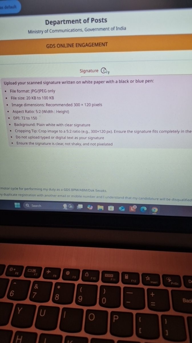 Upload your scanned signature written on white paper with a black or blue..
