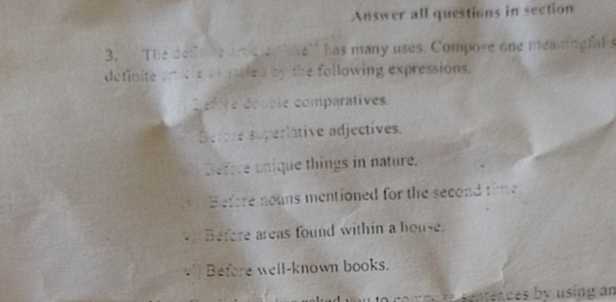 Answer all questions in section The definite article "the" has many uses..