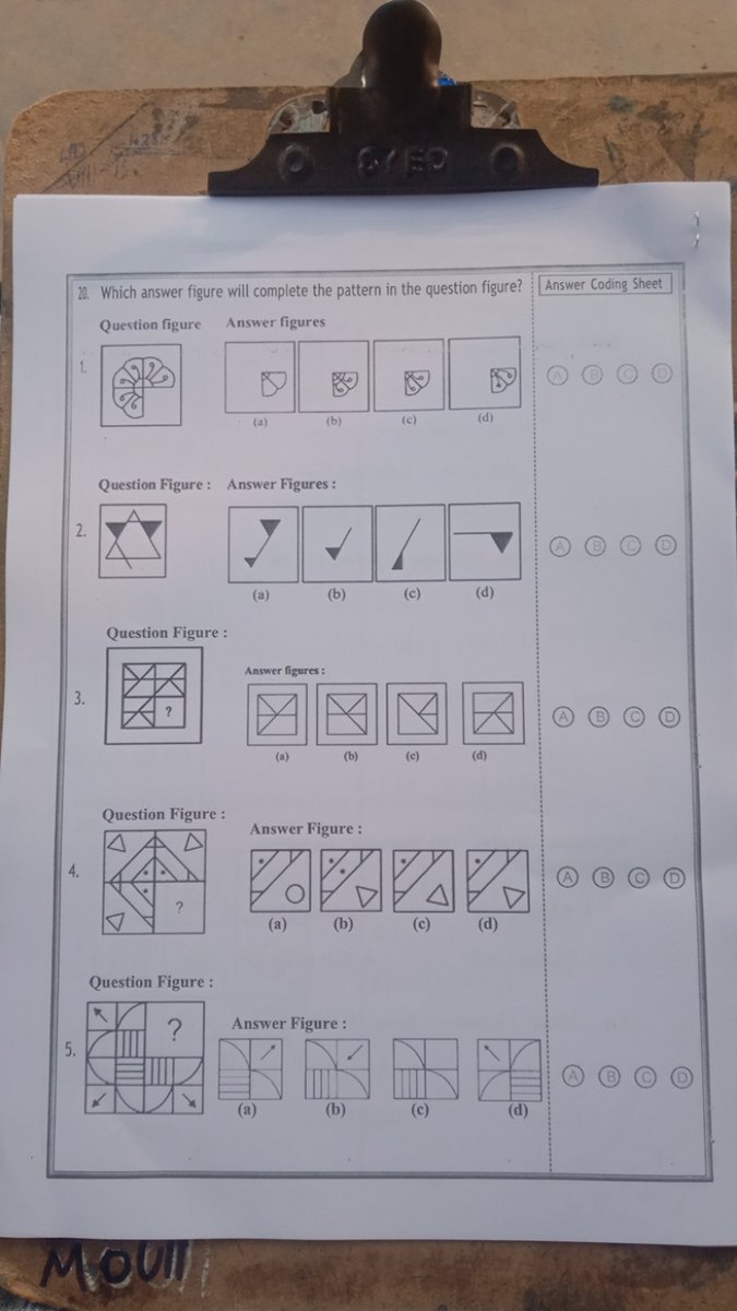 Which answer figure will complete the pattern in the question figure? Qu..