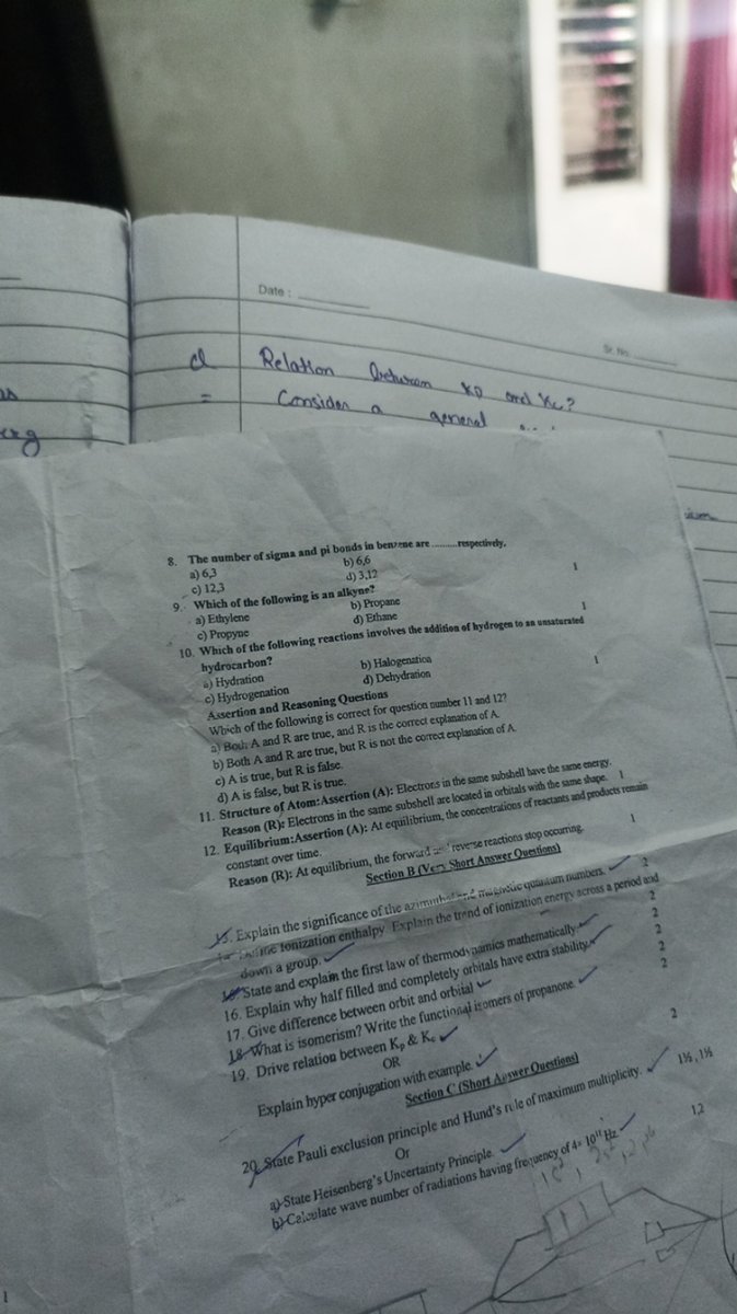 The number of sigma and pi bonds in benzene are respectively. a) 6,3 b) 6..
