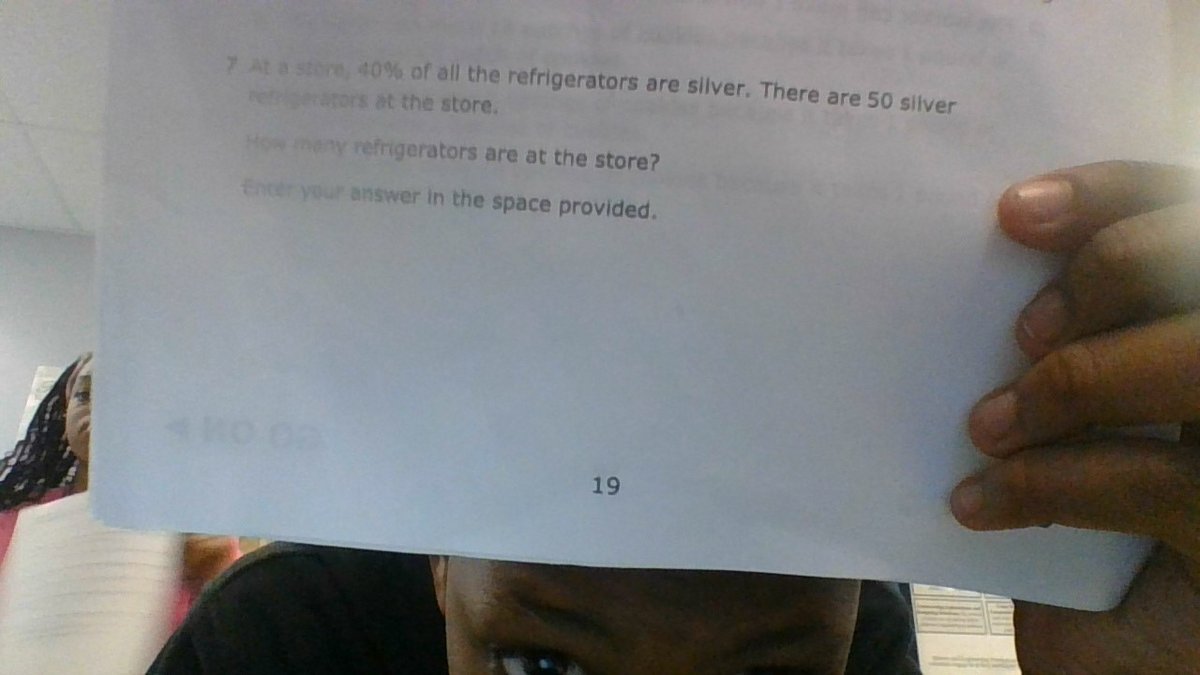 At a store, 40% of all the refrigerators are silver. There are 50 silver